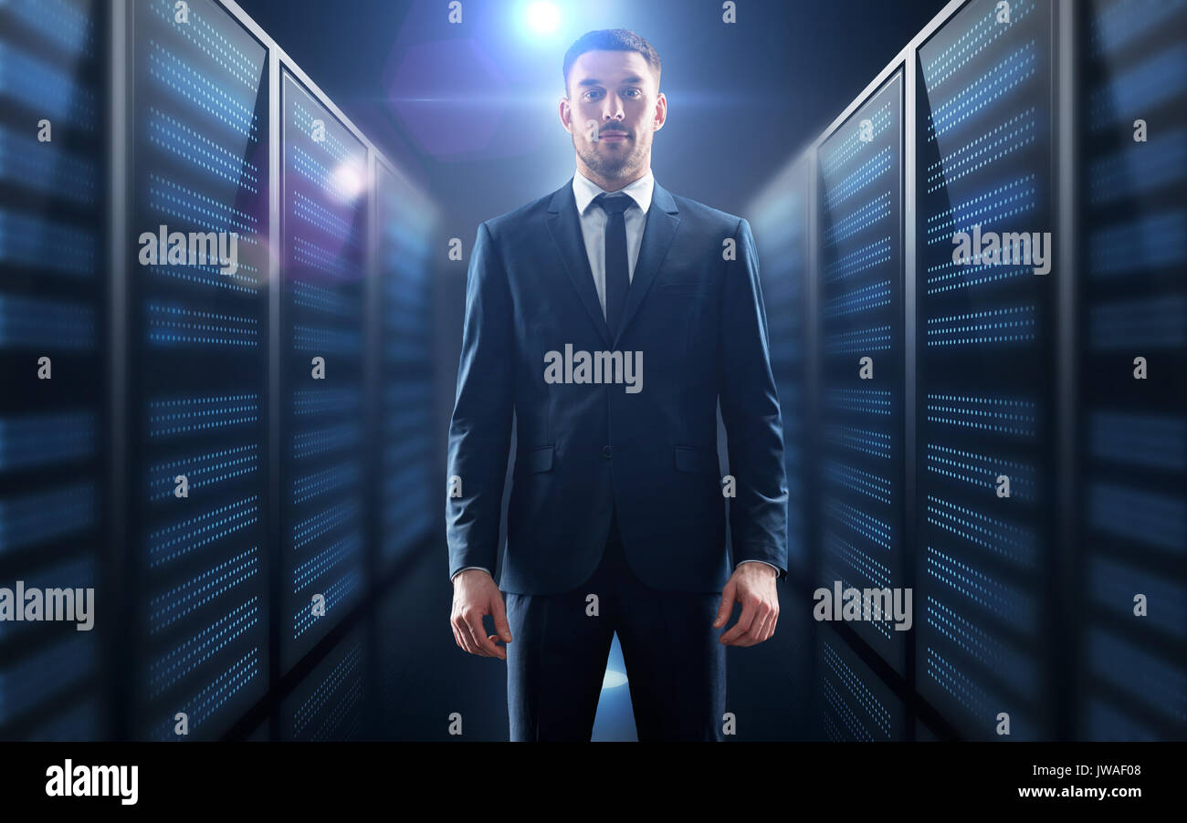 businessman over server room background Stock Photo - Alamy