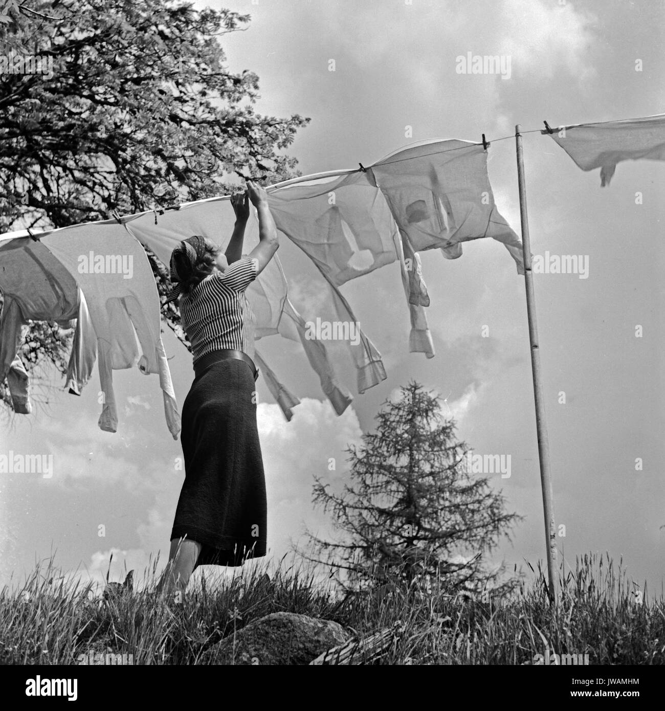 Woman Hanging Laundry Vintage High Resolution Stock Photography and ...