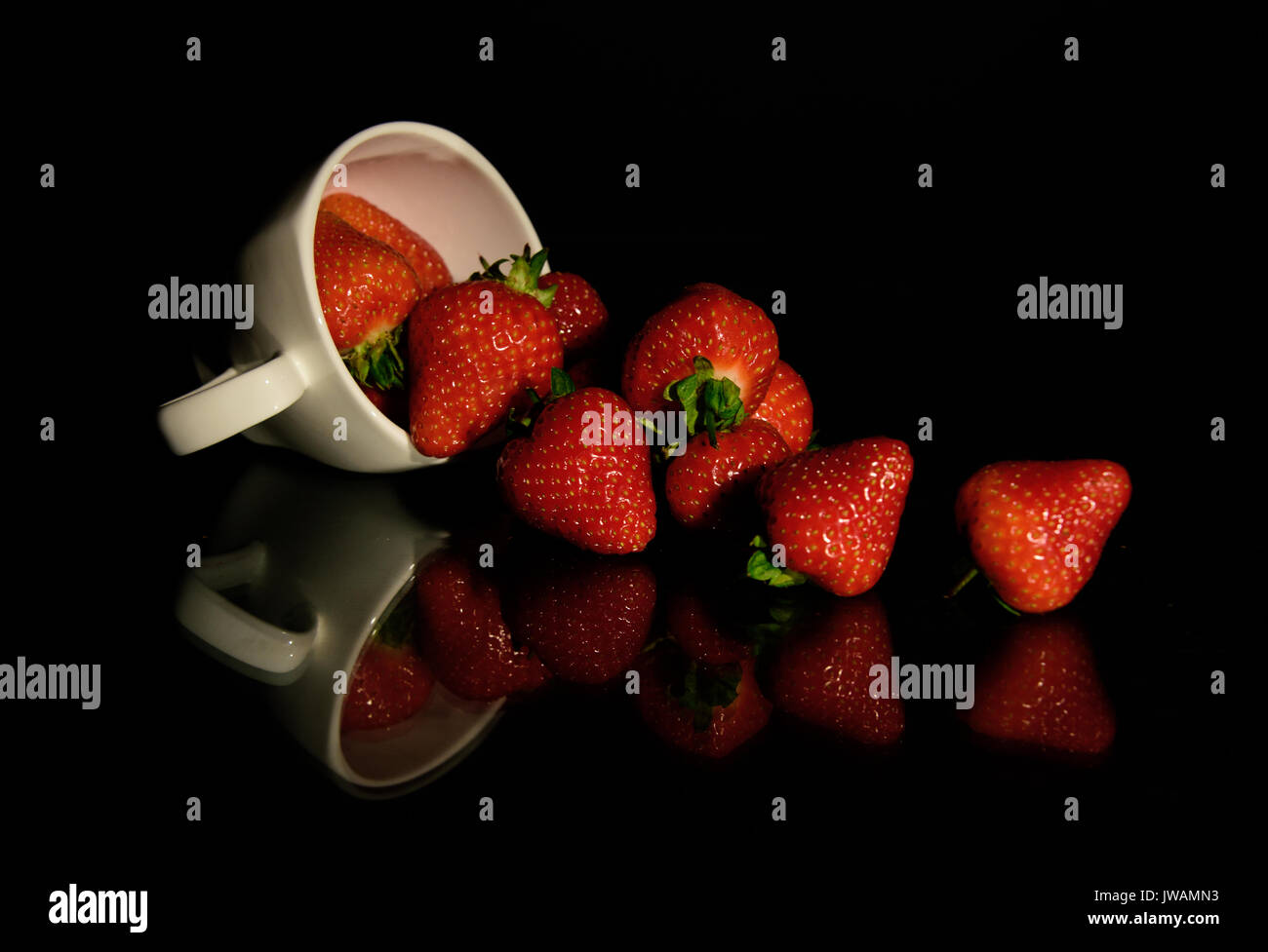 One cup of strawberries Stock Photo - Alamy