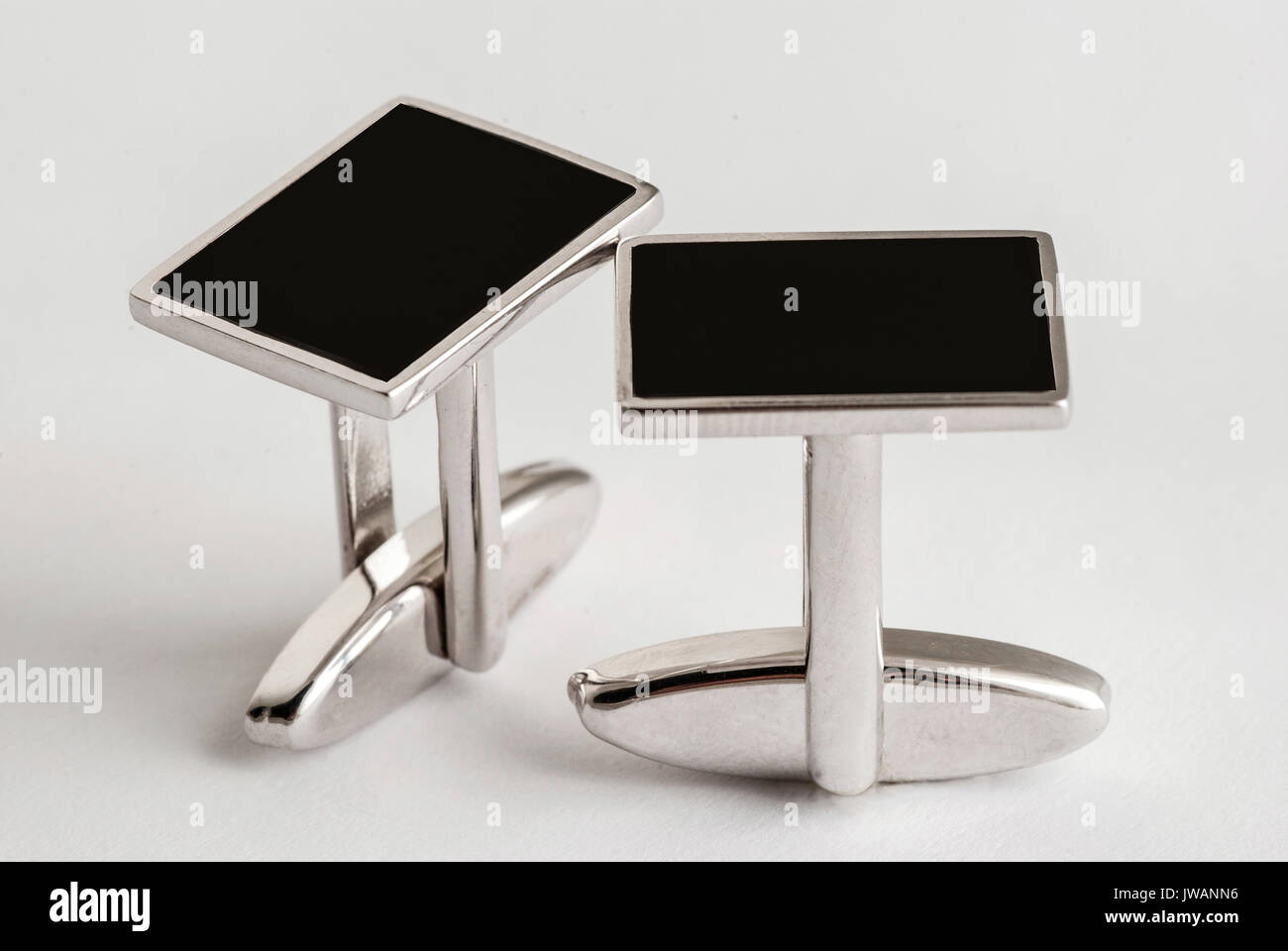 Silver shirt button Stock Photo - Alamy