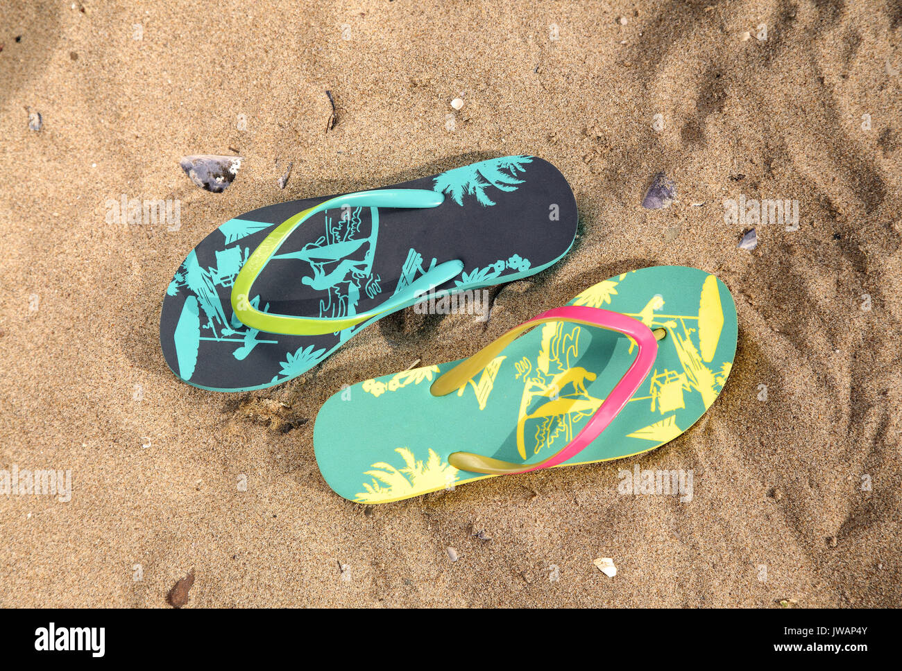 Colorful and different beach slipper Stock Photo - Alamy