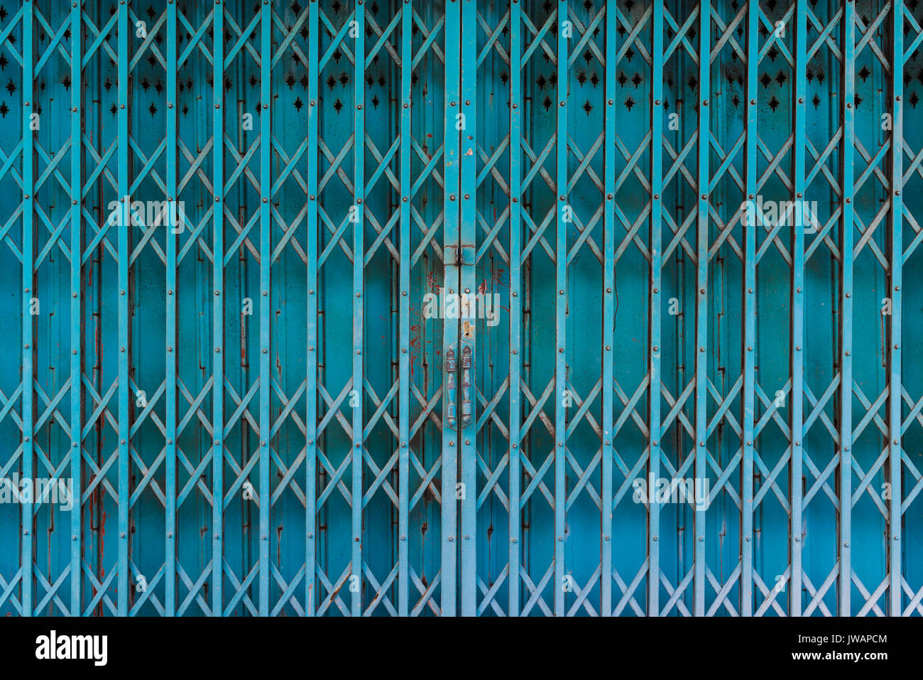 Blue iron shutter door Stock Photo - Alamy
