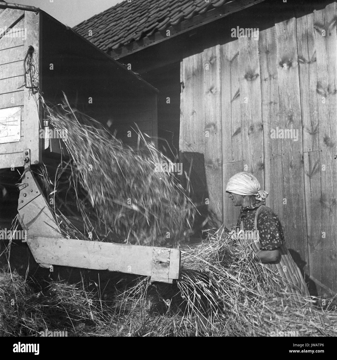 Vintage Threshing Machine Black and White Stock Photos & Images - Alamy