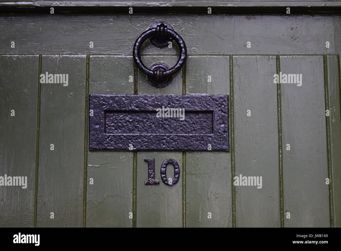 Brass door number 4 hi-res stock photography and images - Alamy