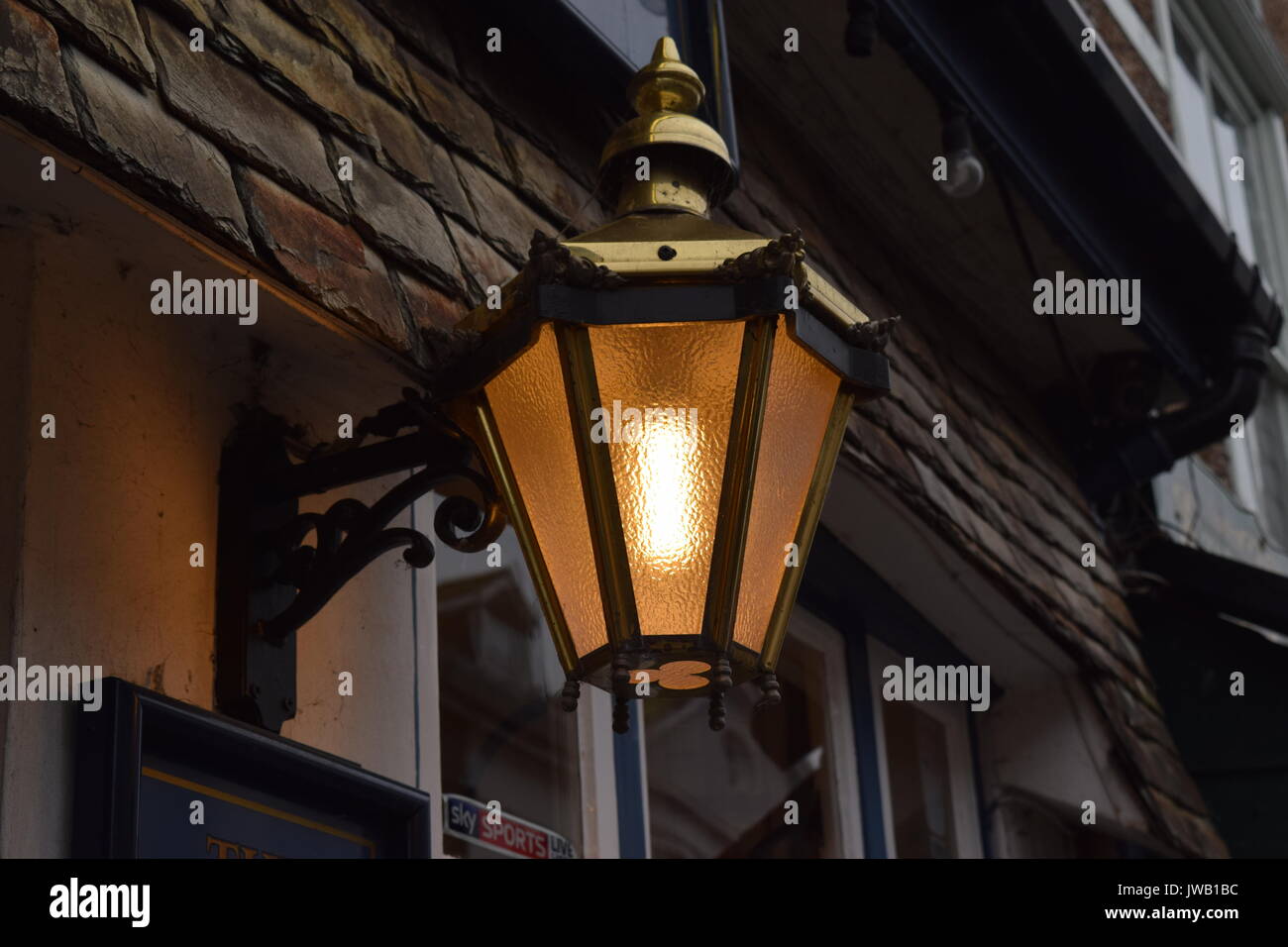 High lamp on a wall Stock Photo - Alamy