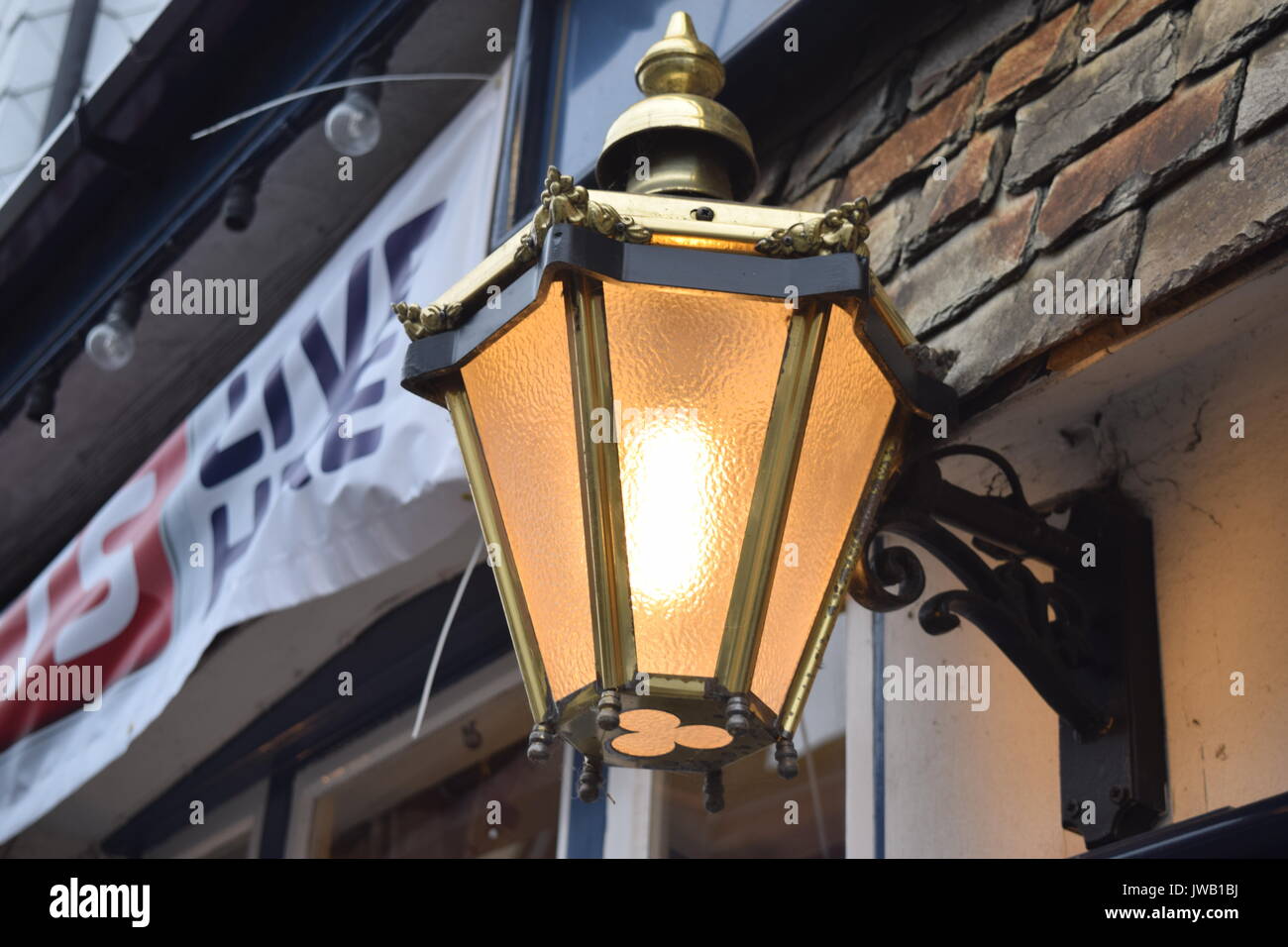 High lamp on a wall Stock Photo - Alamy