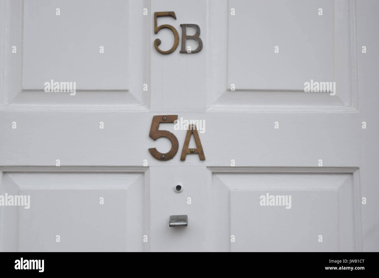 Brass door number 4 hi-res stock photography and images - Alamy