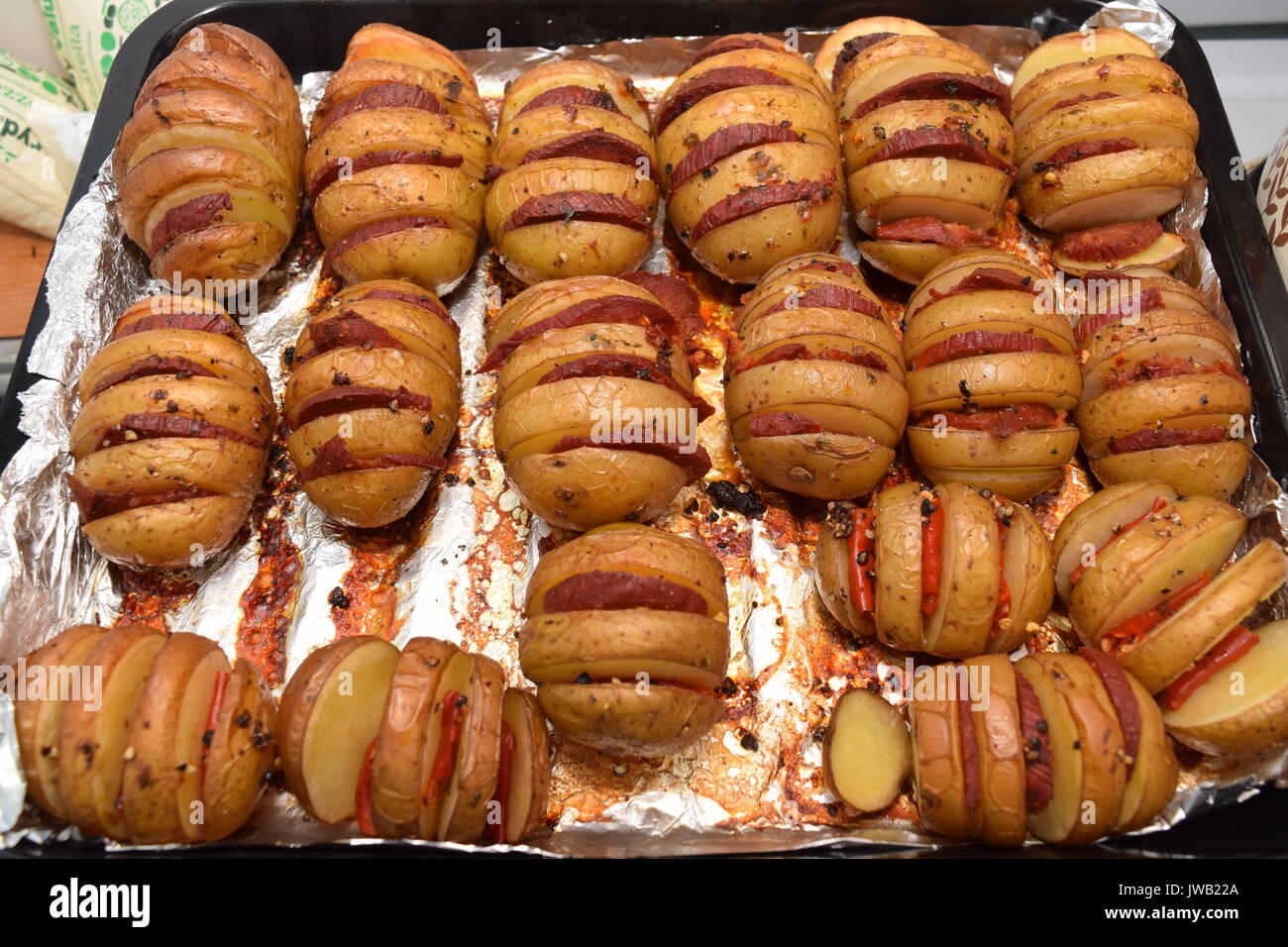 Raw roast potatoes Stock Photo - Alamy
