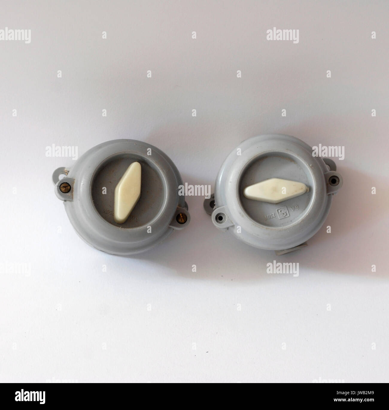 Pair of vintage plastic outdoor rotary switches Stock Photo - Alamy