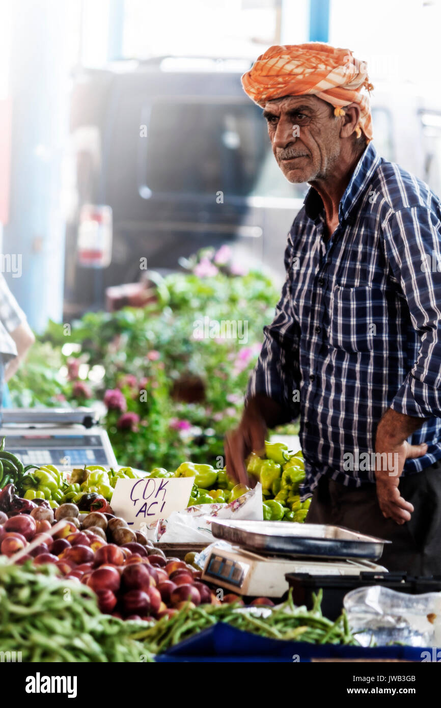 Old man selling vegetables hi-res stock photography and images - Alamy