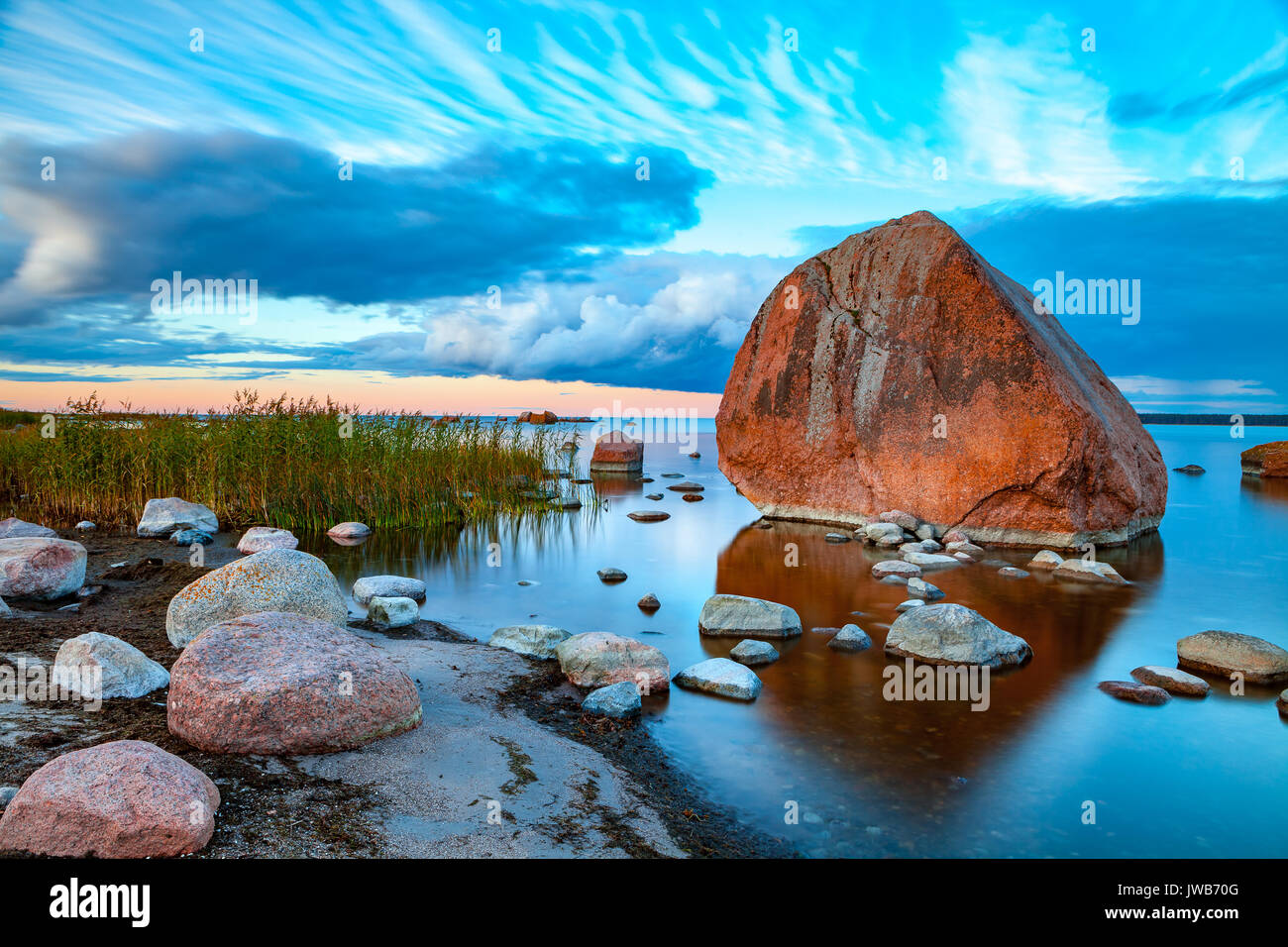 Beautiful beach big stone background hi-res stock photography and ...