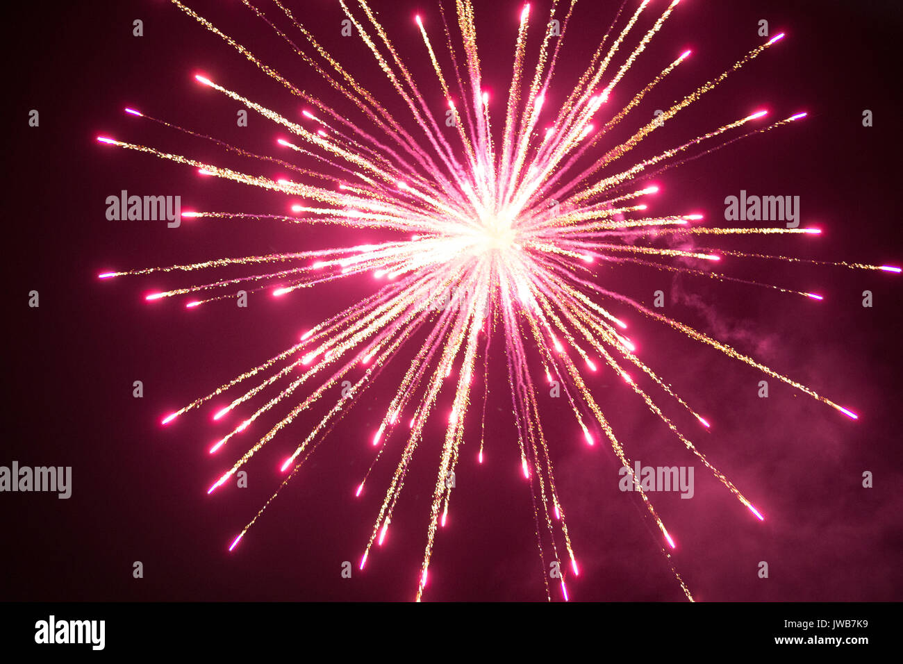 creative fireworks in black background Stock Photo - Alamy