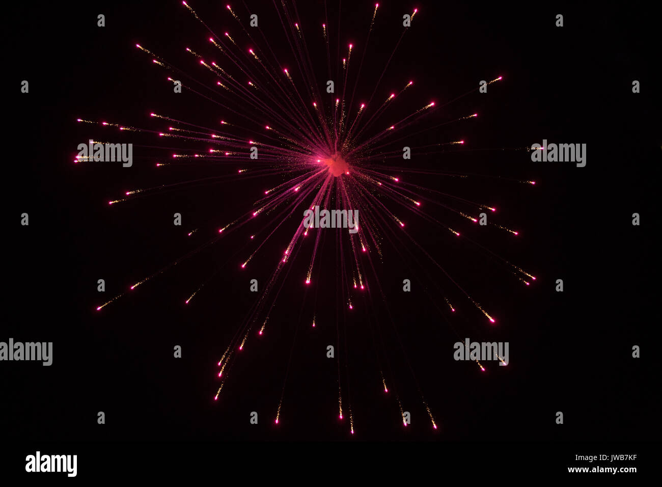 creative fireworks in black background Stock Photo - Alamy