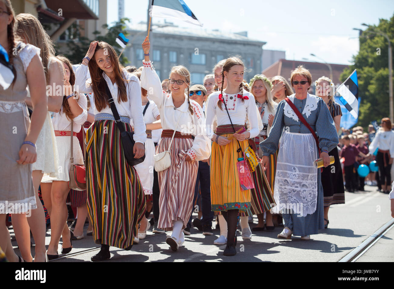 TALLINN, ESTONIA - 04 JUL 2014: People in Estonian costumes going at ...