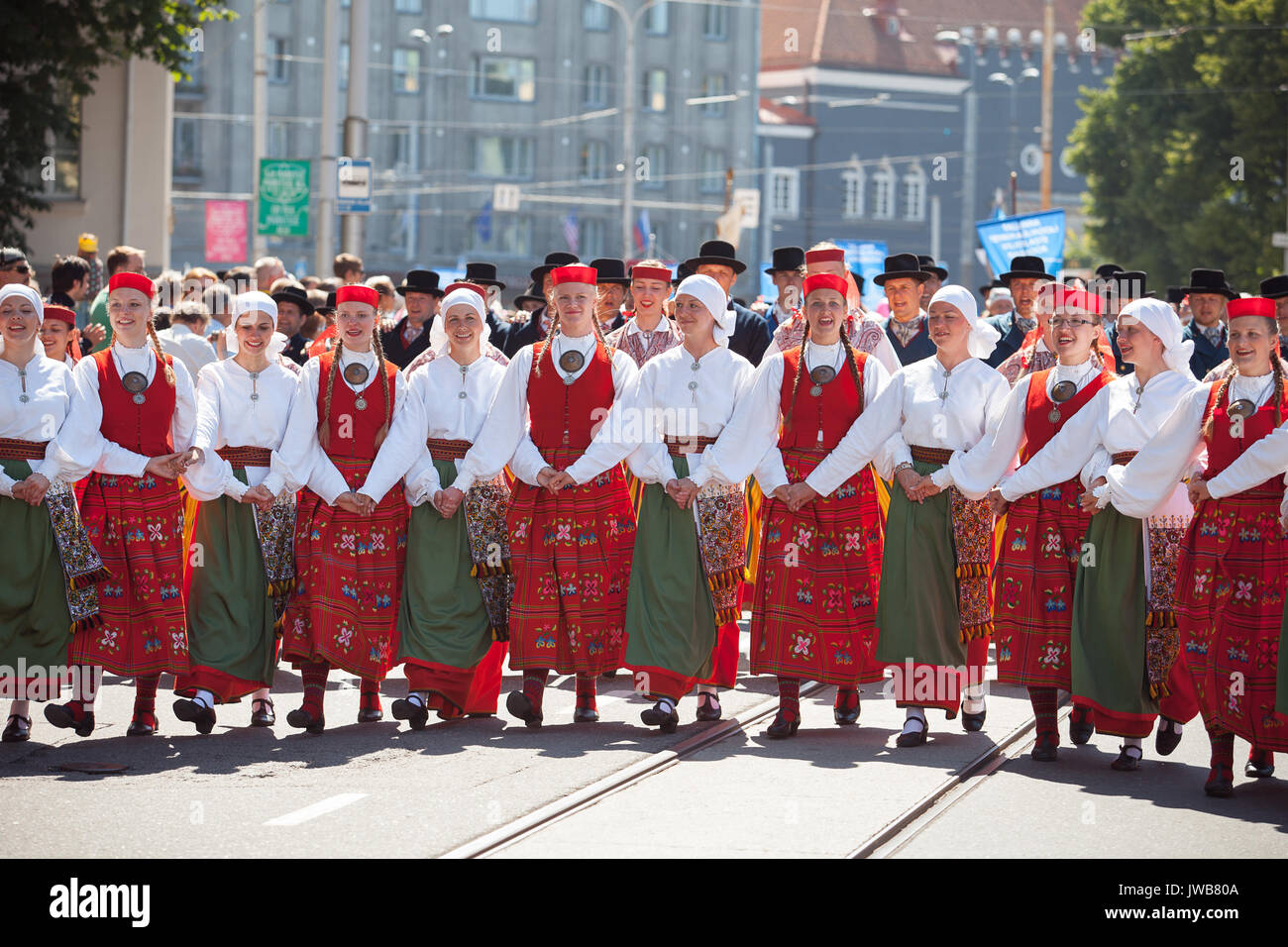 TALLINN, ESTONIA - 04 JUL 2014: People in Estonian costumes going at ...
