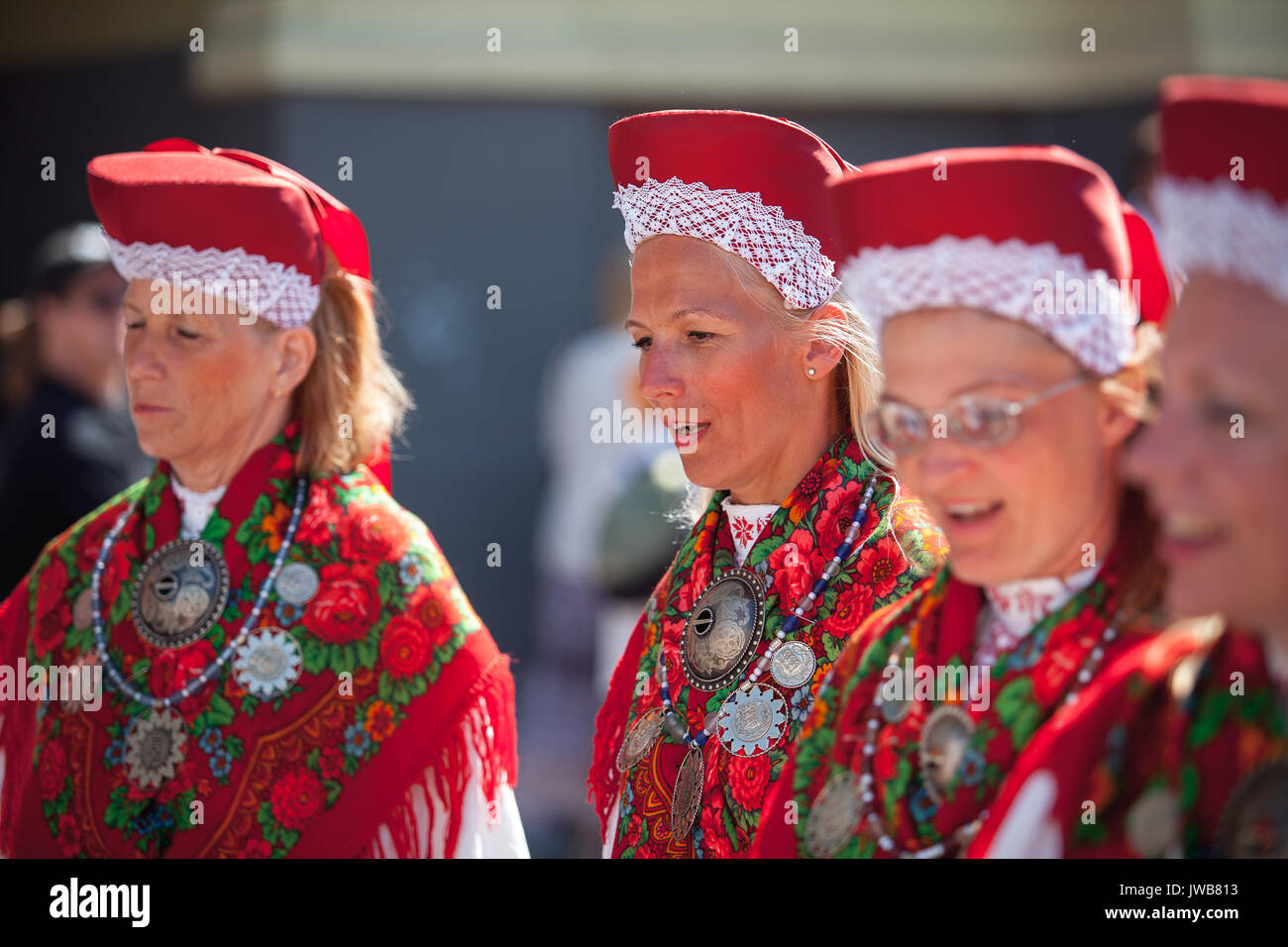 TALLINN, ESTONIA - 04 JUL 2014: People in Estonian costumes going at ...