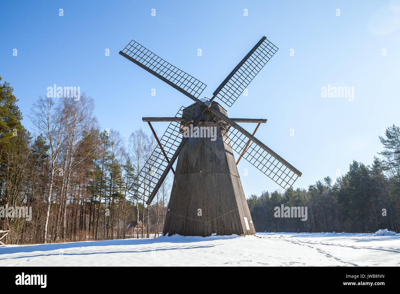 Antique wooden windmill. Winter contryside scene Stock Photo - Alamy