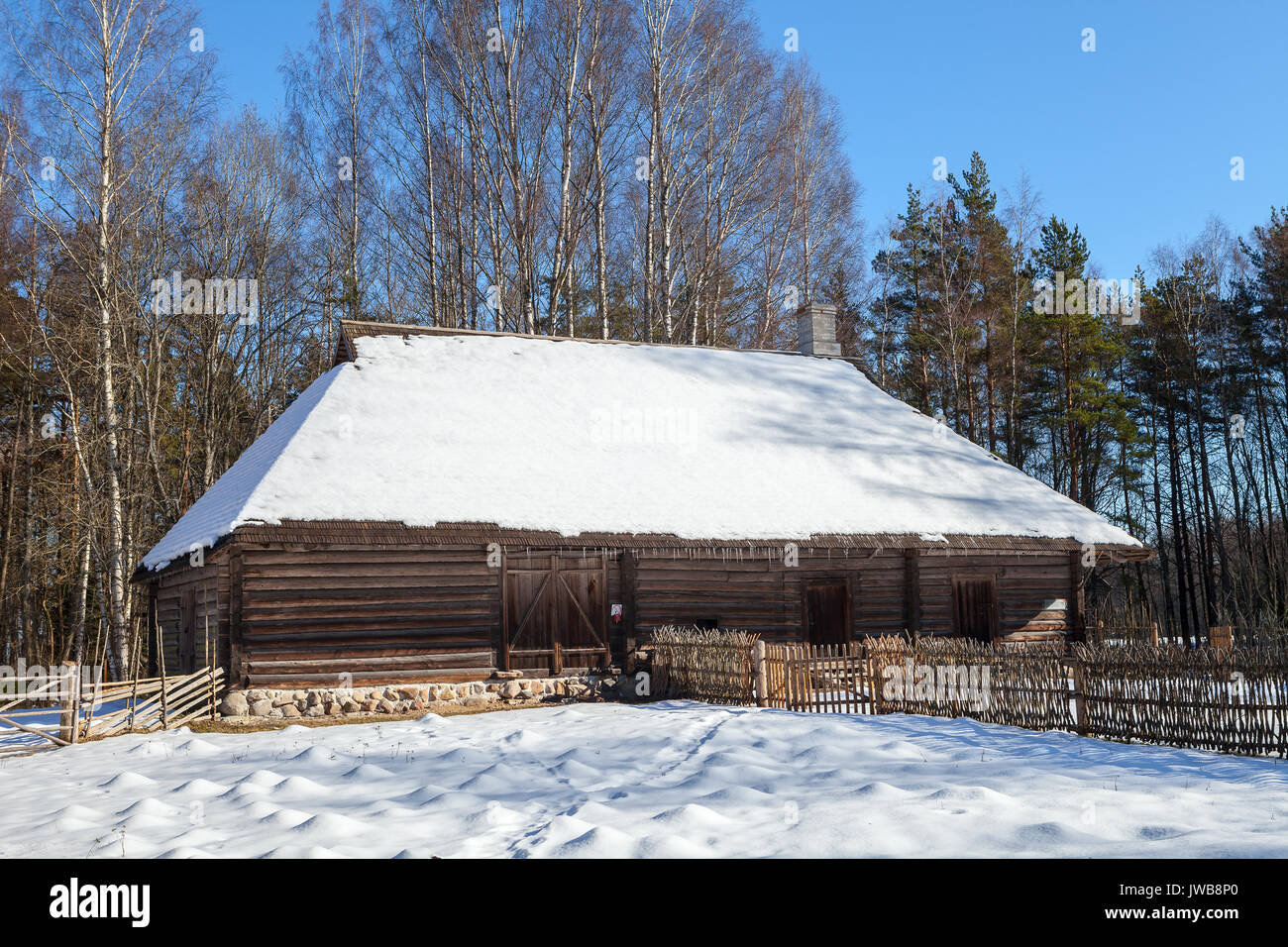 Traditional wooden barn, baltic and scandinavian style. Winter scene in ...
