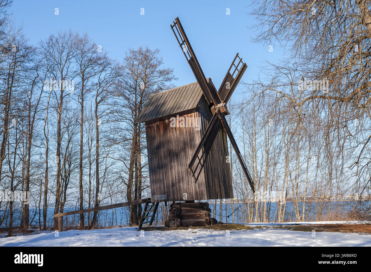 Antique wooden windmill. Winter contryside scene Stock Photo - Alamy