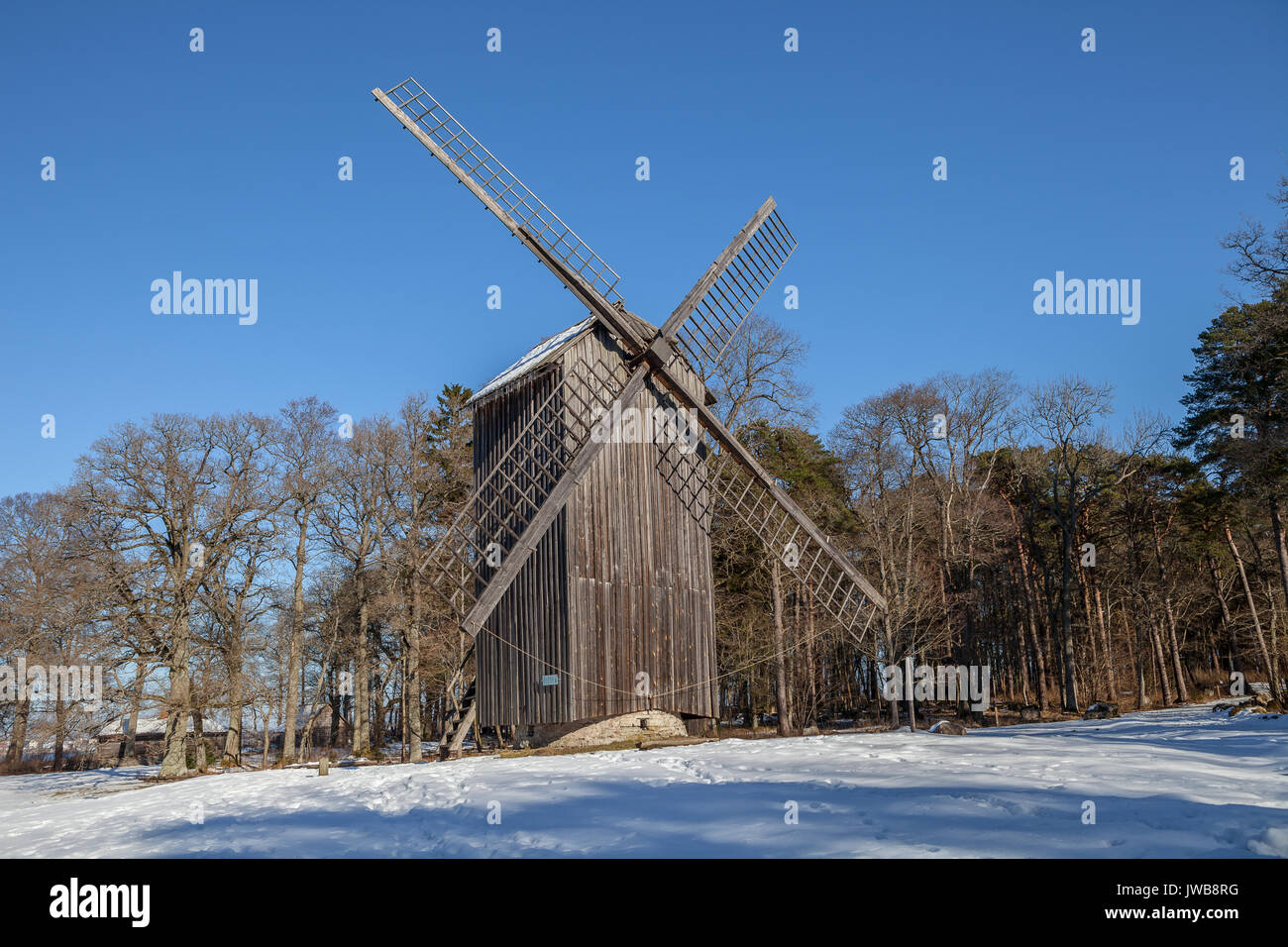 Antique wooden windmill. Winter contryside scene Stock Photo - Alamy