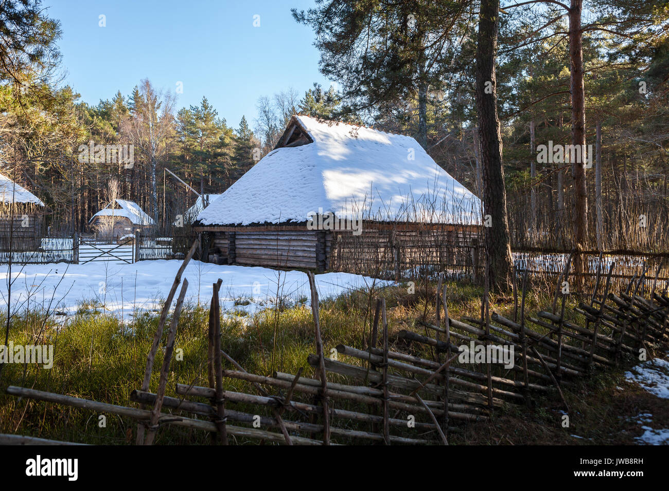 Traditional wooden barn, baltic and scandinavian style. Winter scene in ...