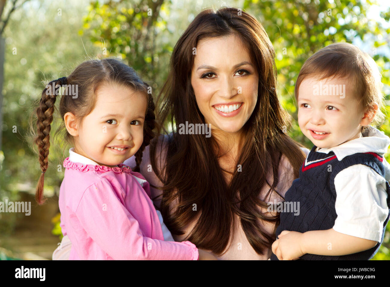 Portrait of a Hispanic mother and her children Stock Photo - Alamy