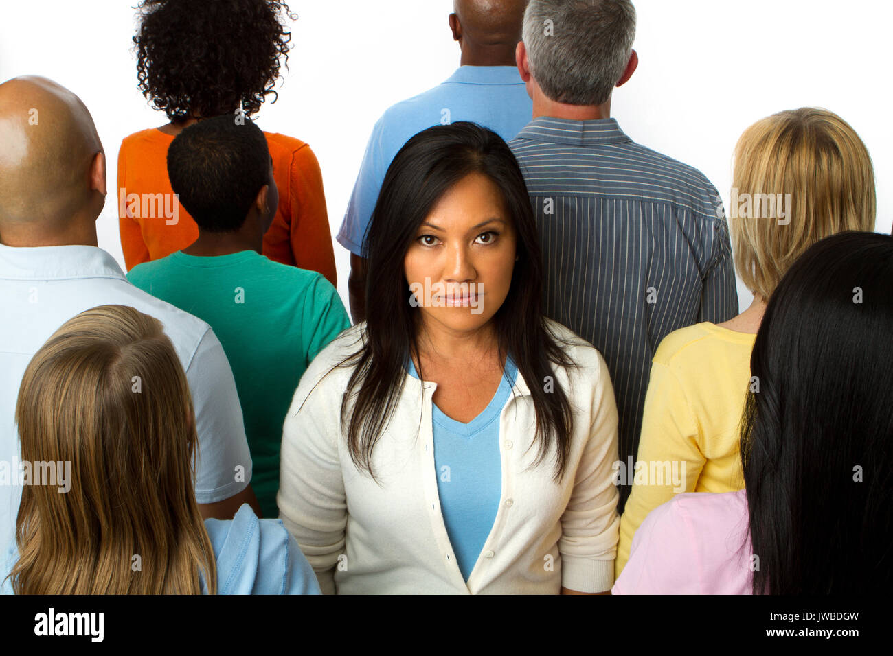 One Person Standing Alone In A Crowd