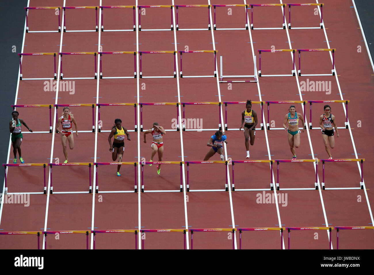 A general view as athletes race in heat 2 of the Women's 100m hurdles ...