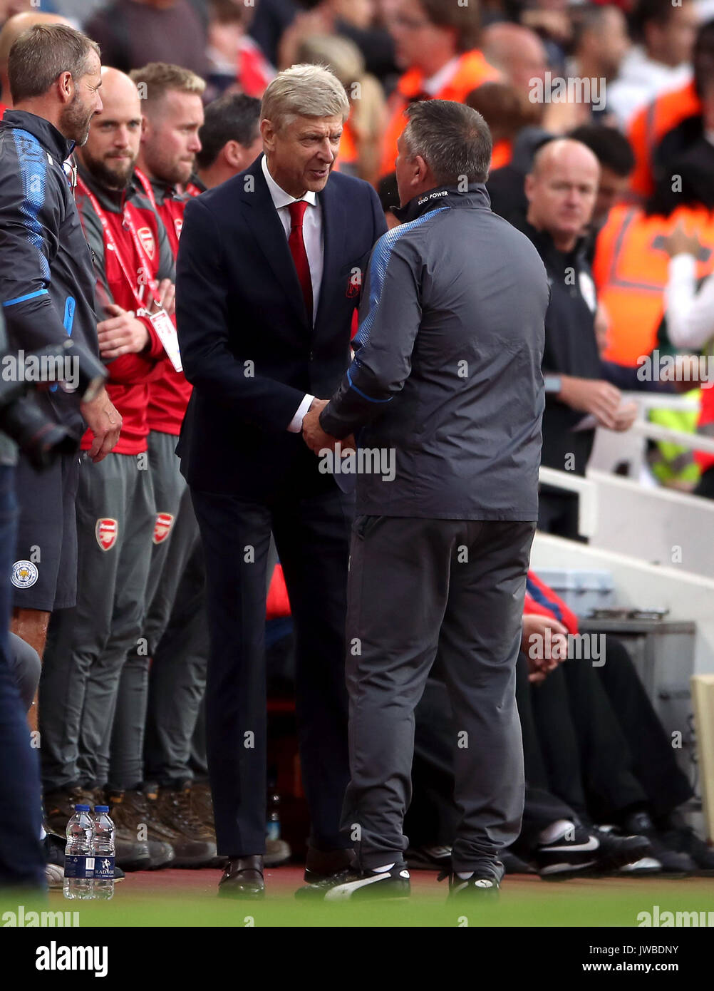 Arsenal manager Arsene Wenger (left) and Leicester City manager Craig ...