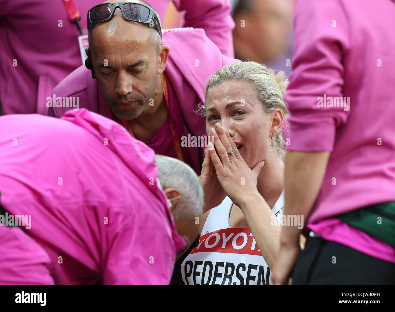 Norway's Isabelle Pedersen receives treatment for an injury in the ...