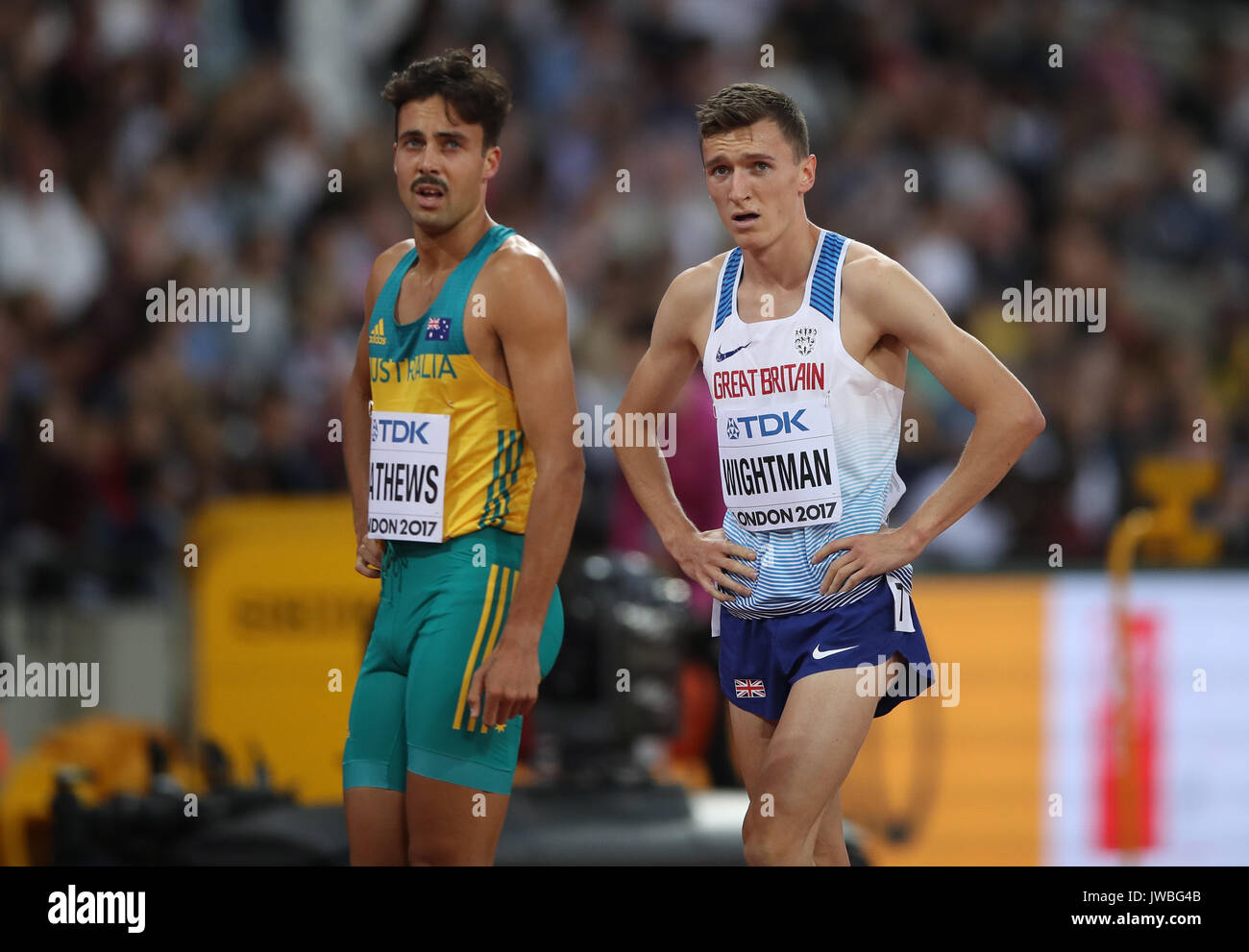 Great Britain's Jake Wightman (right) reacts after competing in heat 1 ...