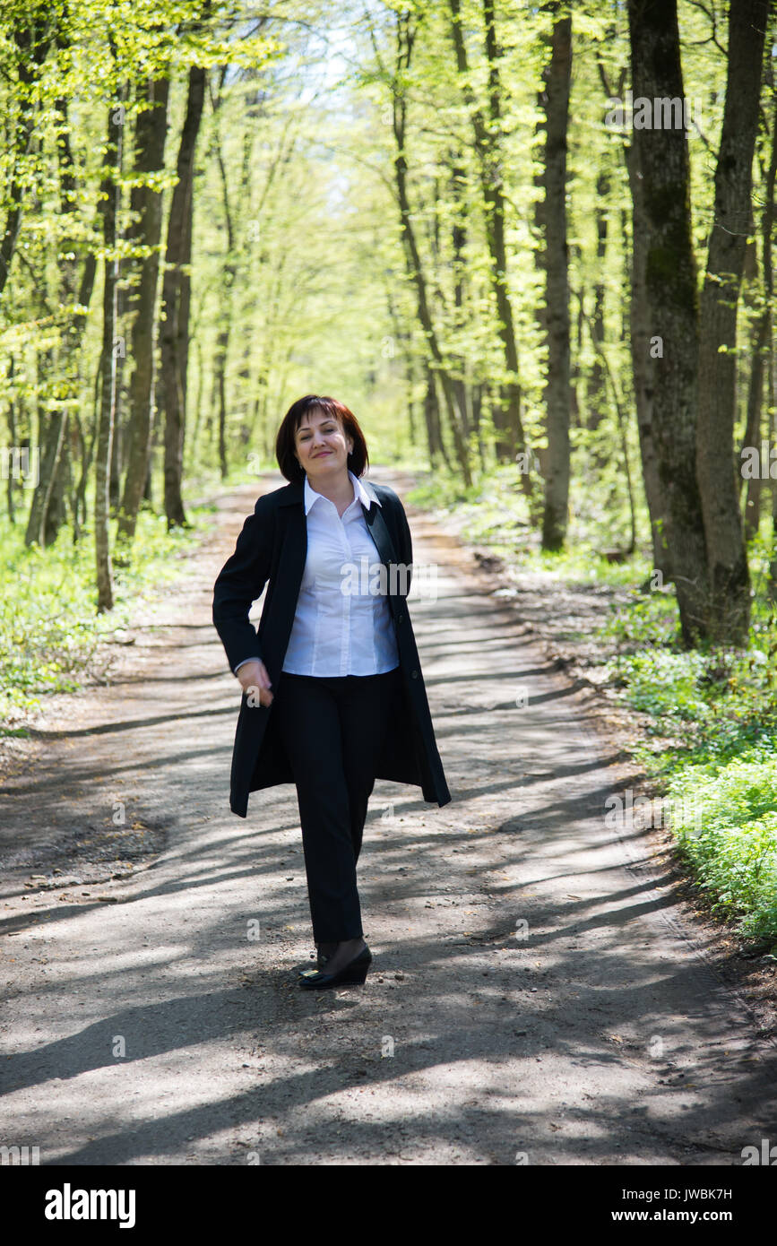 Cute woman on the walk Stock Photo - Alamy