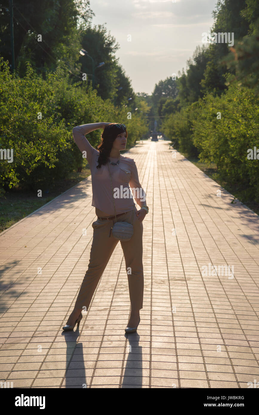 Young beautiful girl on a walk Stock Photo - Alamy