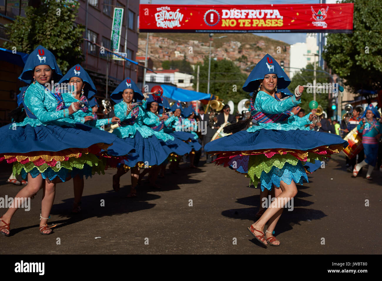 Llamerada dancers in ornate costumes performing as they parade through ...