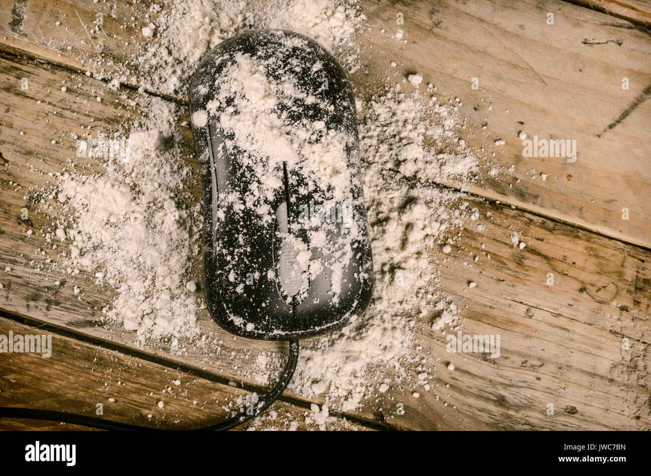 Computer mouse covered in dust, a concept Stock Photo - Alamy