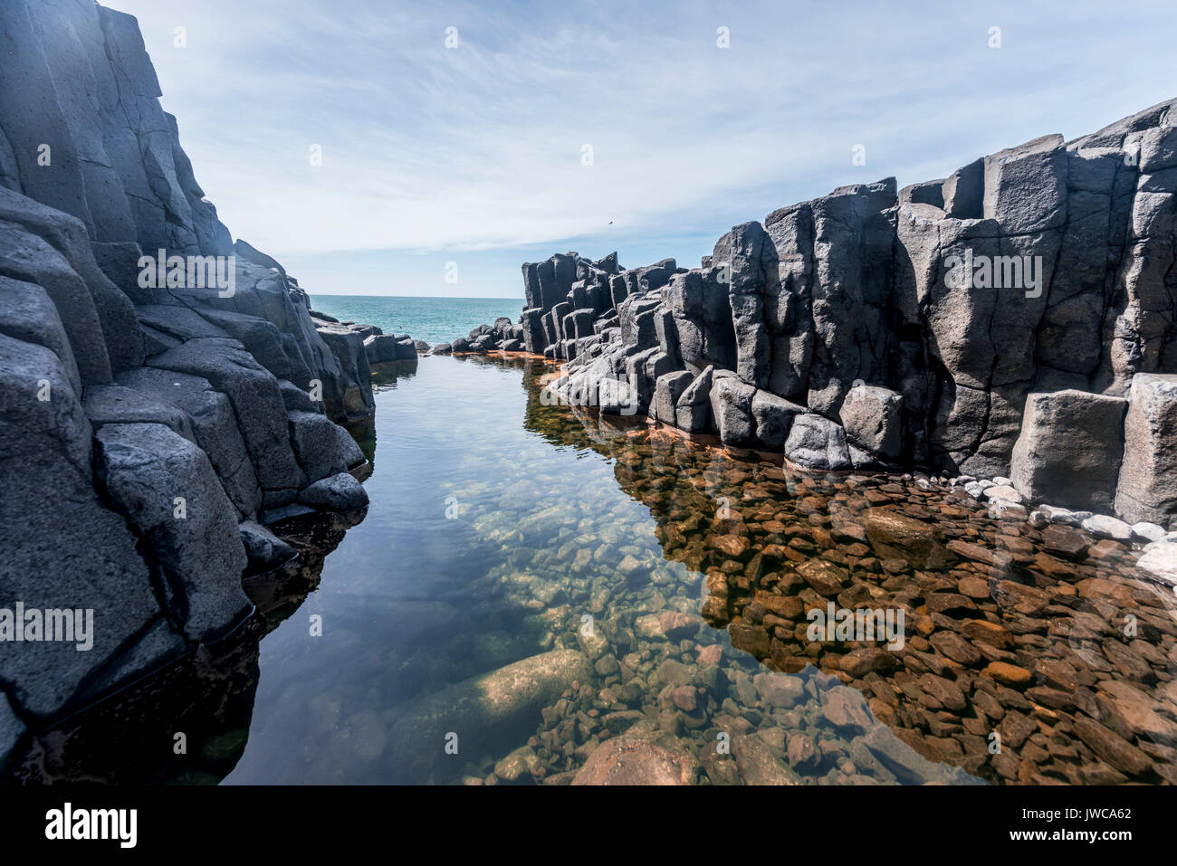 Water gathering between rocks, Roman Bath, Hexagonal basalt column by ...