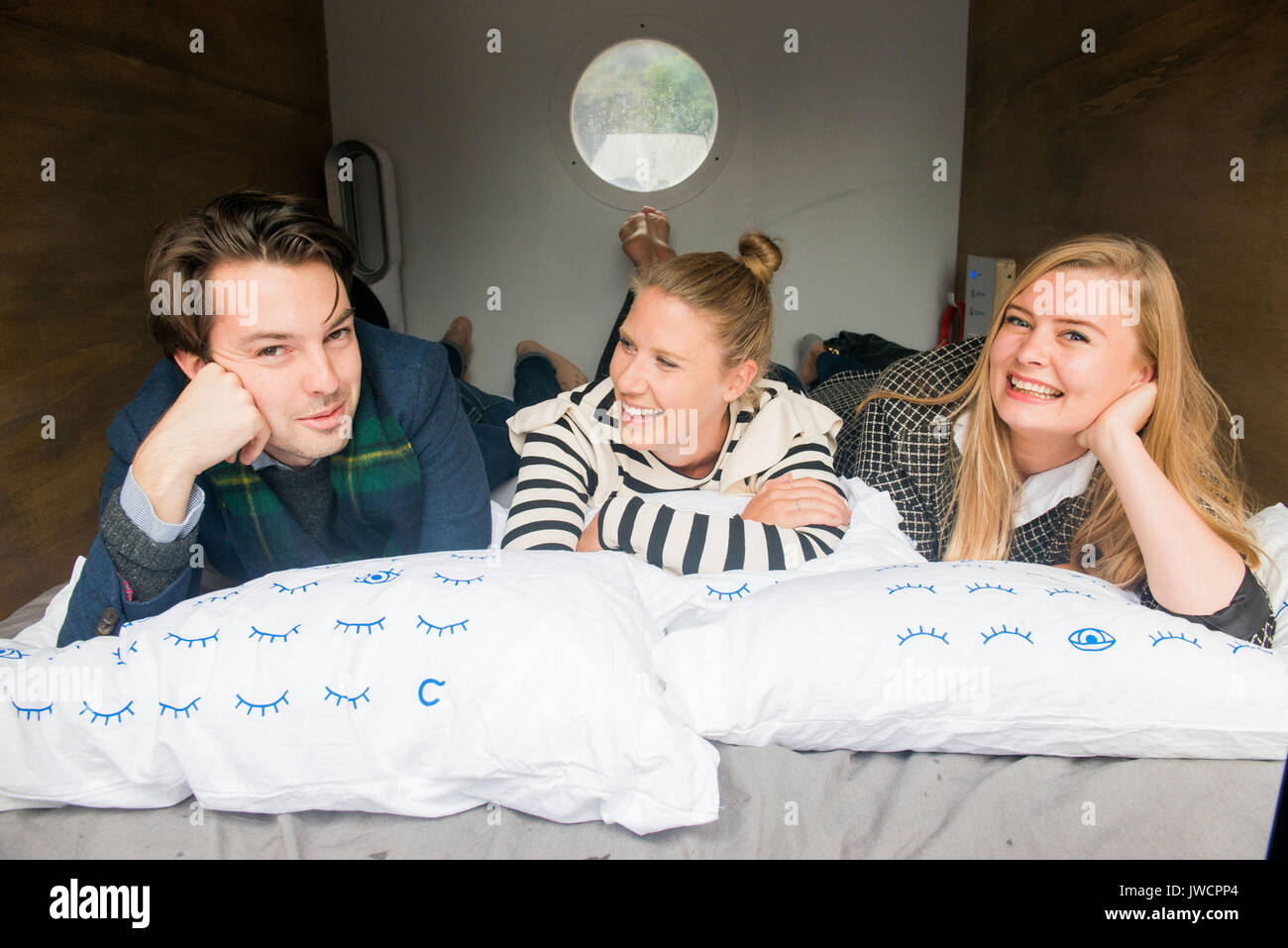 James Gill, Fiona Campbell and Lauren Plews try out the sleep pods I’m ...