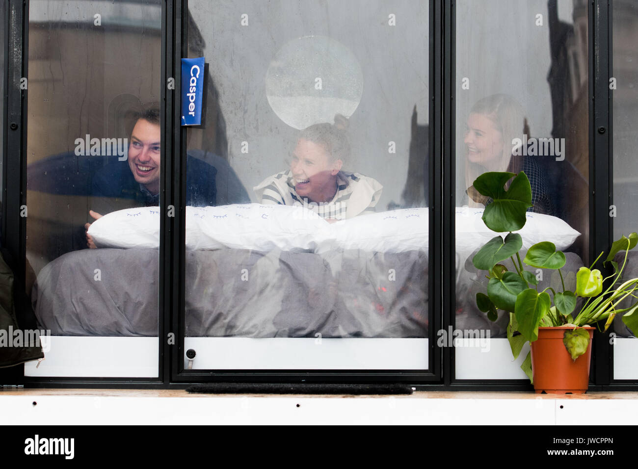 James Gill, Fiona Campbell and Lauren Plews try out the sleep pods I’m ...