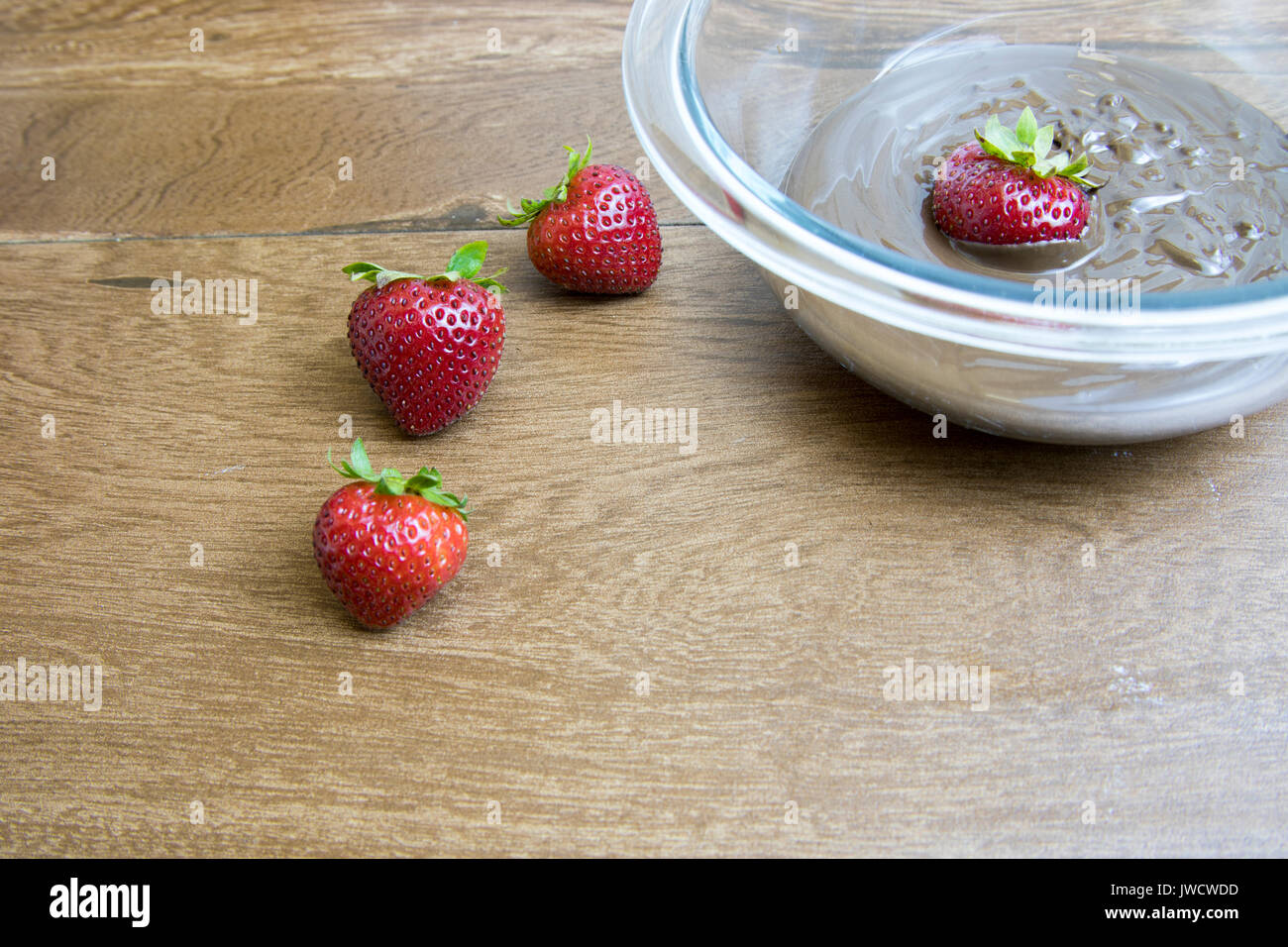 Milk chocolate covered strawberries hi-res stock photography and images ...