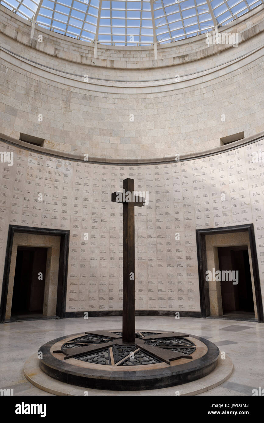 Central cross under skylight with names of the interred at the war ...