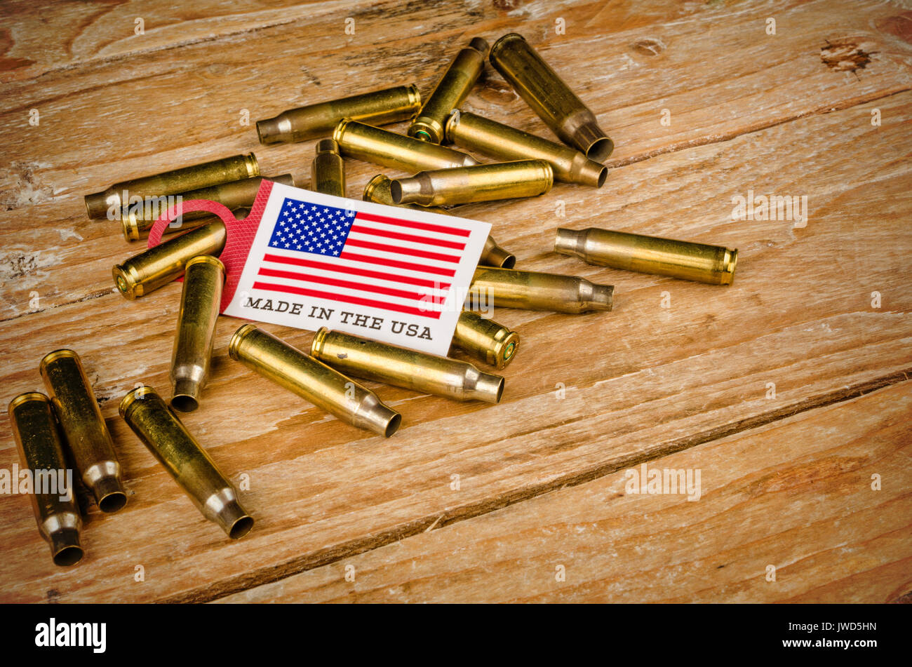Bullet shells and US flag, a cultural concept Stock Photo - Alamy