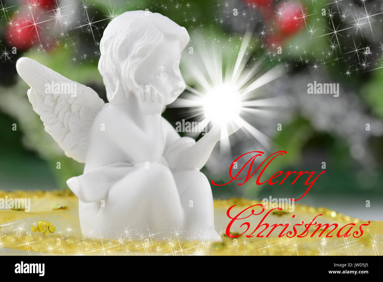 A small figure of ceramic angel toy in different compositions Stock ...