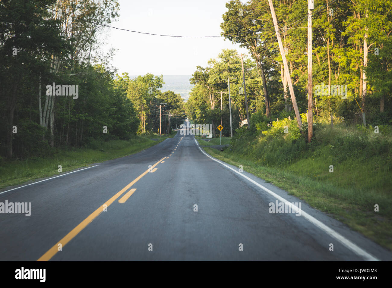 Empty rural road in the hilly countryside of upstate New York Stock ...