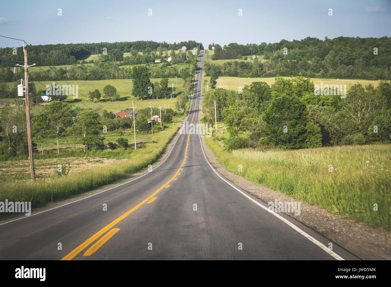Empty rural road in the hilly countryside of upstate New York Stock ...