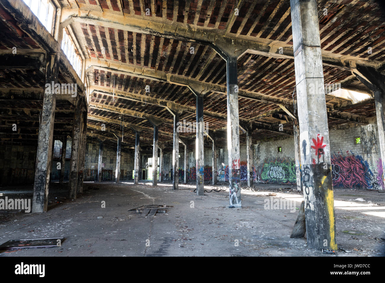 Fire damaged interior of a large train roundhouse and depot in upstate ...