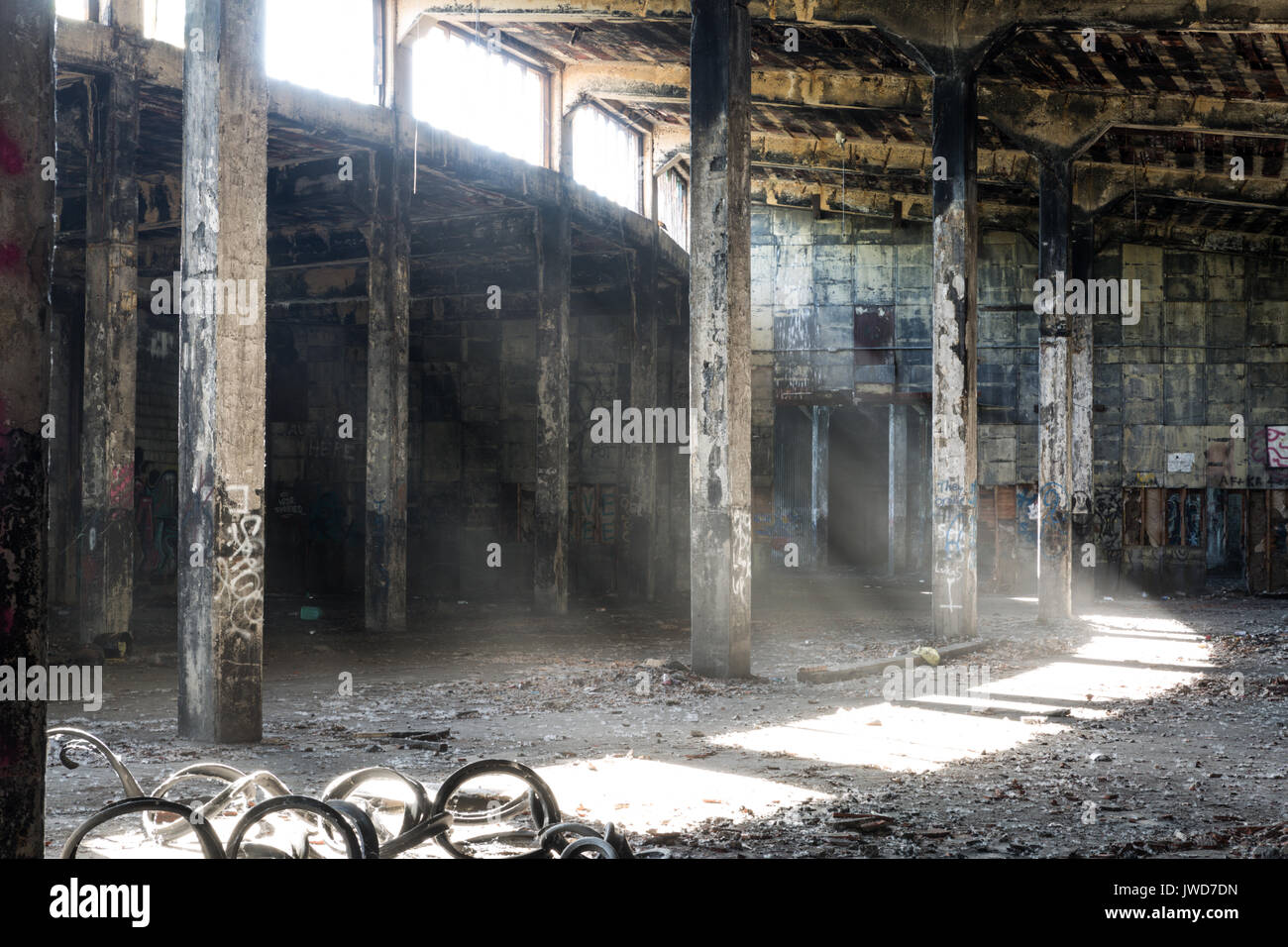 Fire damaged interior of a large train roundhouse and depot in upstate ...