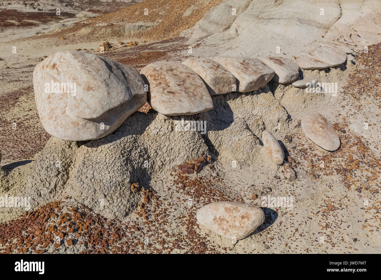 Eroded clay formations with rocks hi-res stock photography and images ...