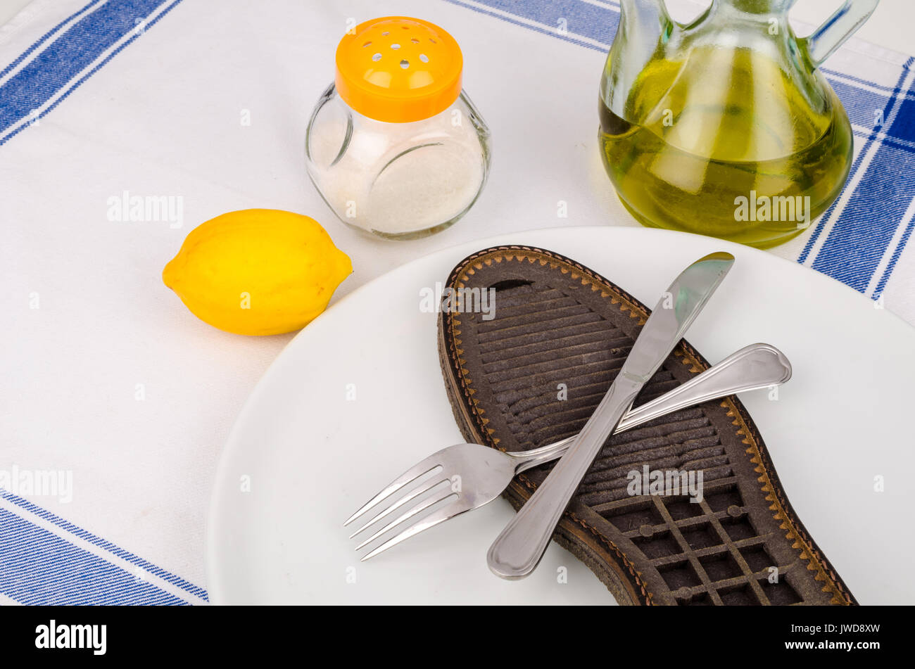 Shoe sole dished, a concept for bad cooking and tough steaks Stock ...