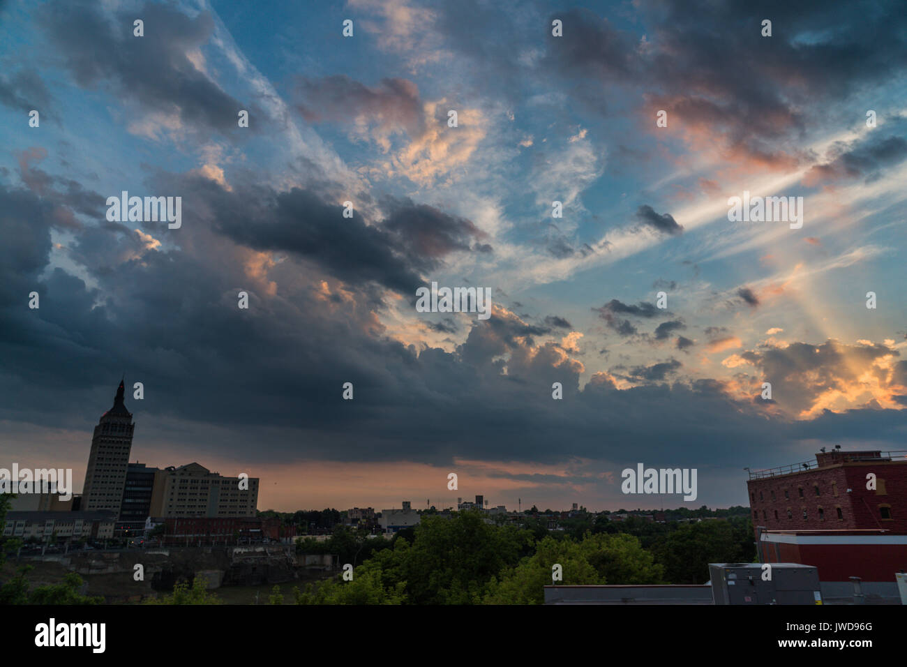 Colorful sunset sky over the high falls in downtown Rochester New York ...