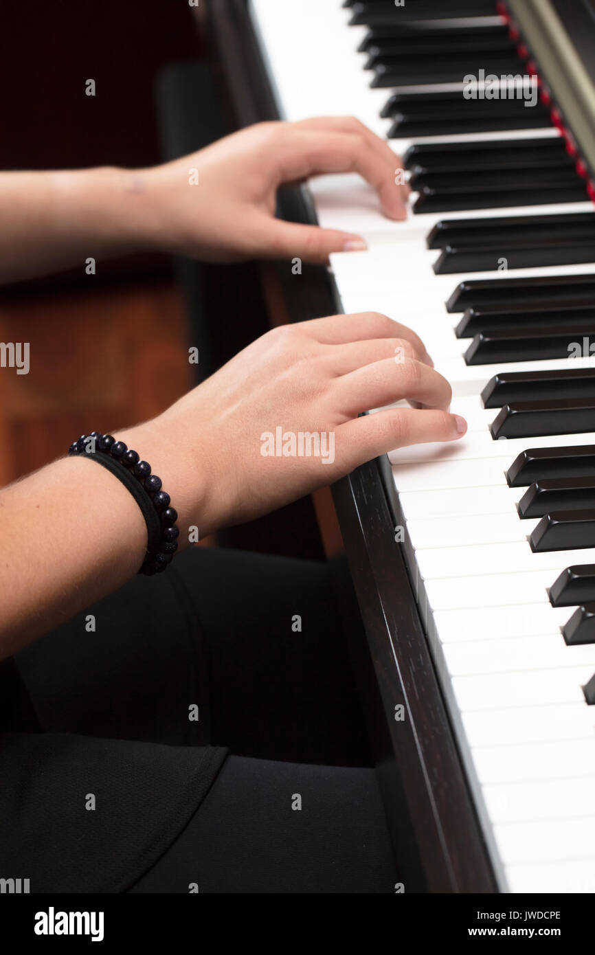 Person Playing The Piano High Resolution Stock Photography and Images ...